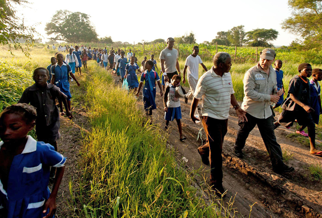 The team visit some Zambian children at a Comic Relief project